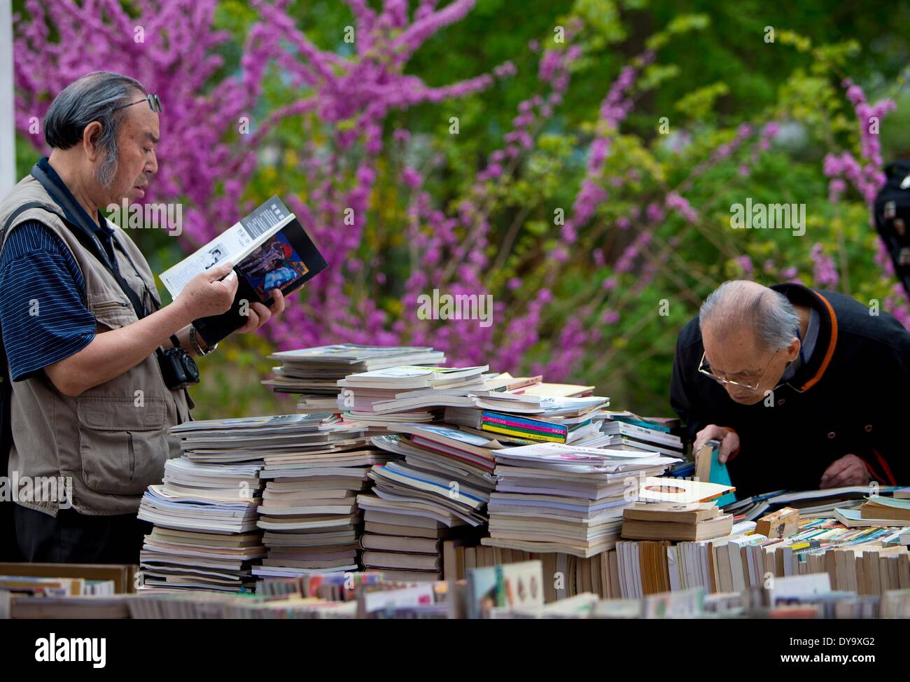 Beijing, China. 11th Apr, 2014. Readers select books at 2014 Beijing ...
