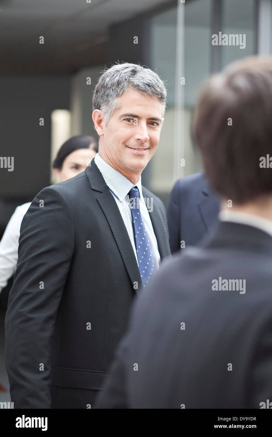 Business portraits grey background hi-res stock photography and images ...