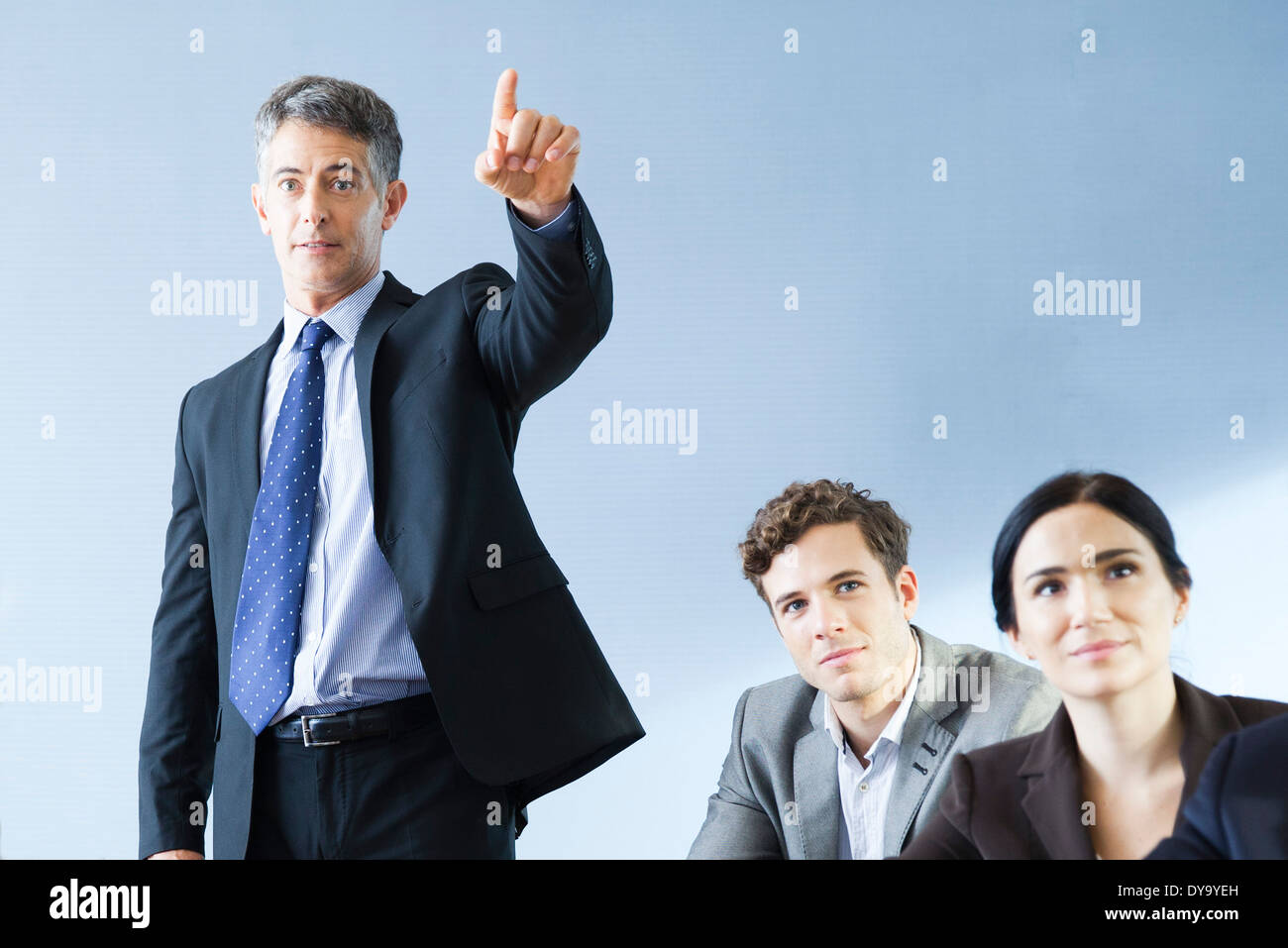 Corporate trainer leading training session Stock Photo - Alamy
