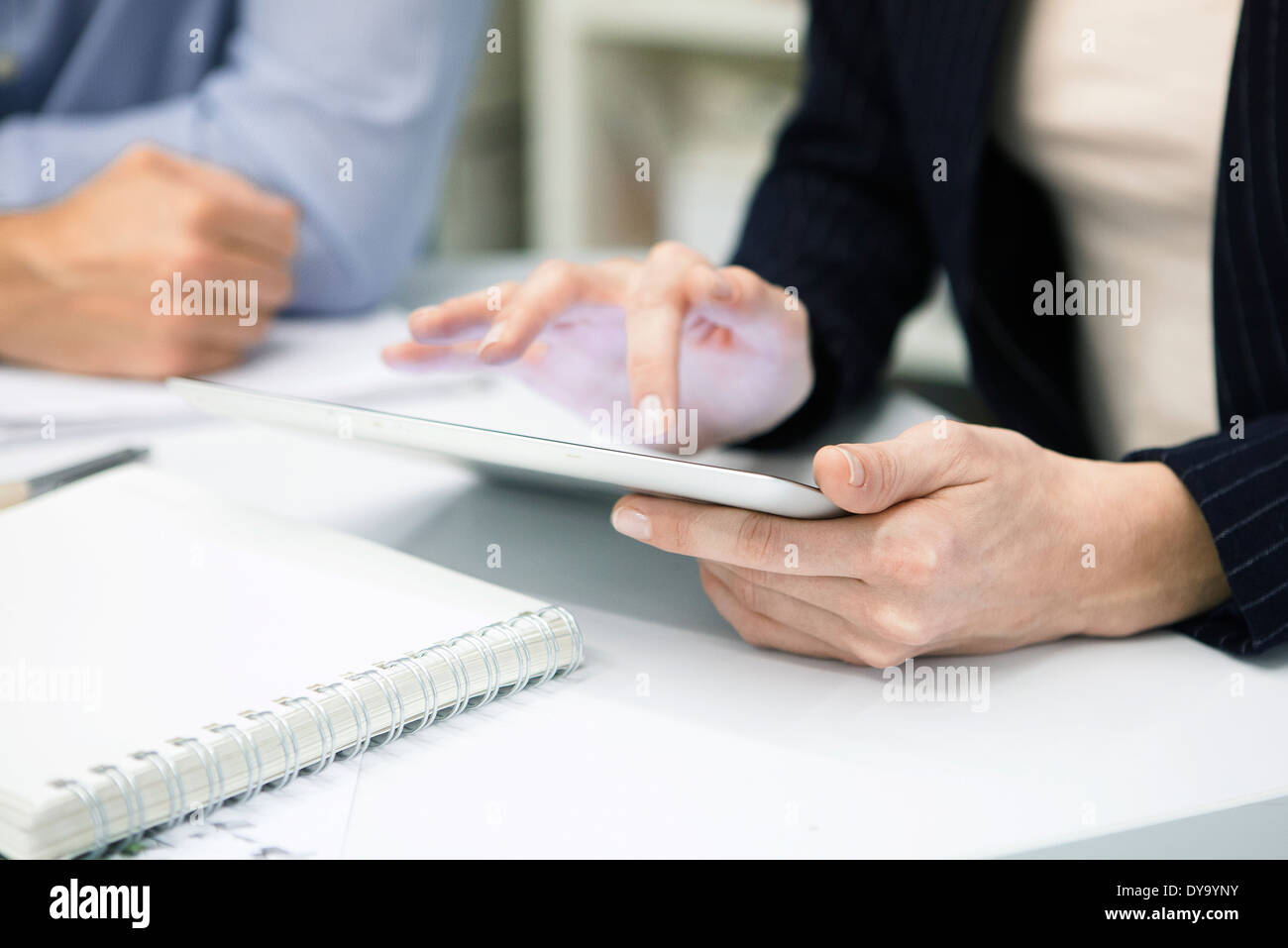 Using digital tablets and laptops hi-res stock photography and images ...