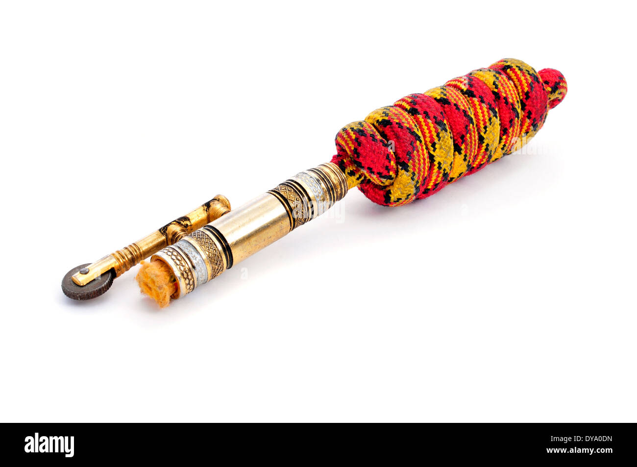 closeup of an old spanish lighter called mechero on a white background ...