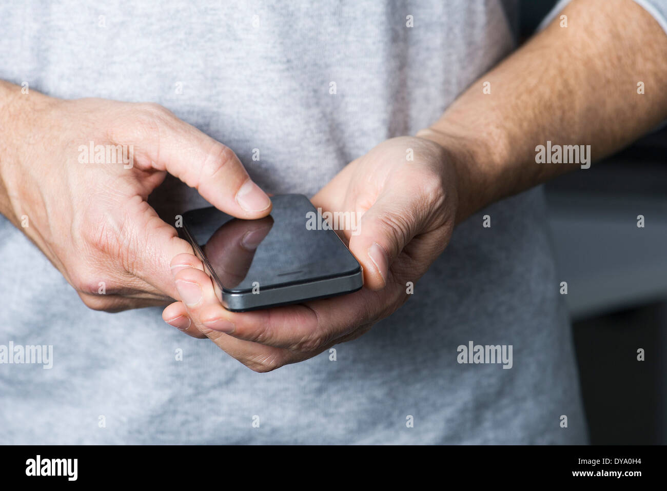 Using multimedia smartphone, close-up Stock Photo - Alamy