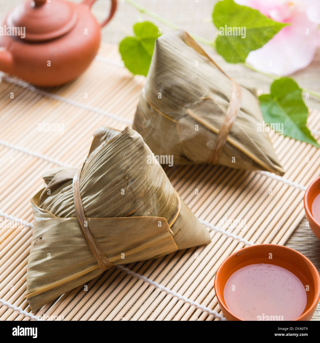 Asian Chinese rice dumplings with tea Stock Photo - Alamy