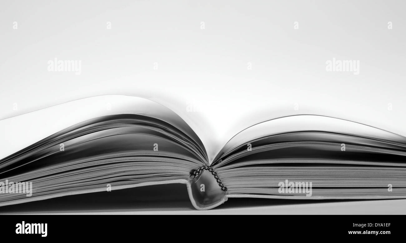 view of open book on white sheet in black and white Stock Photo - Alamy