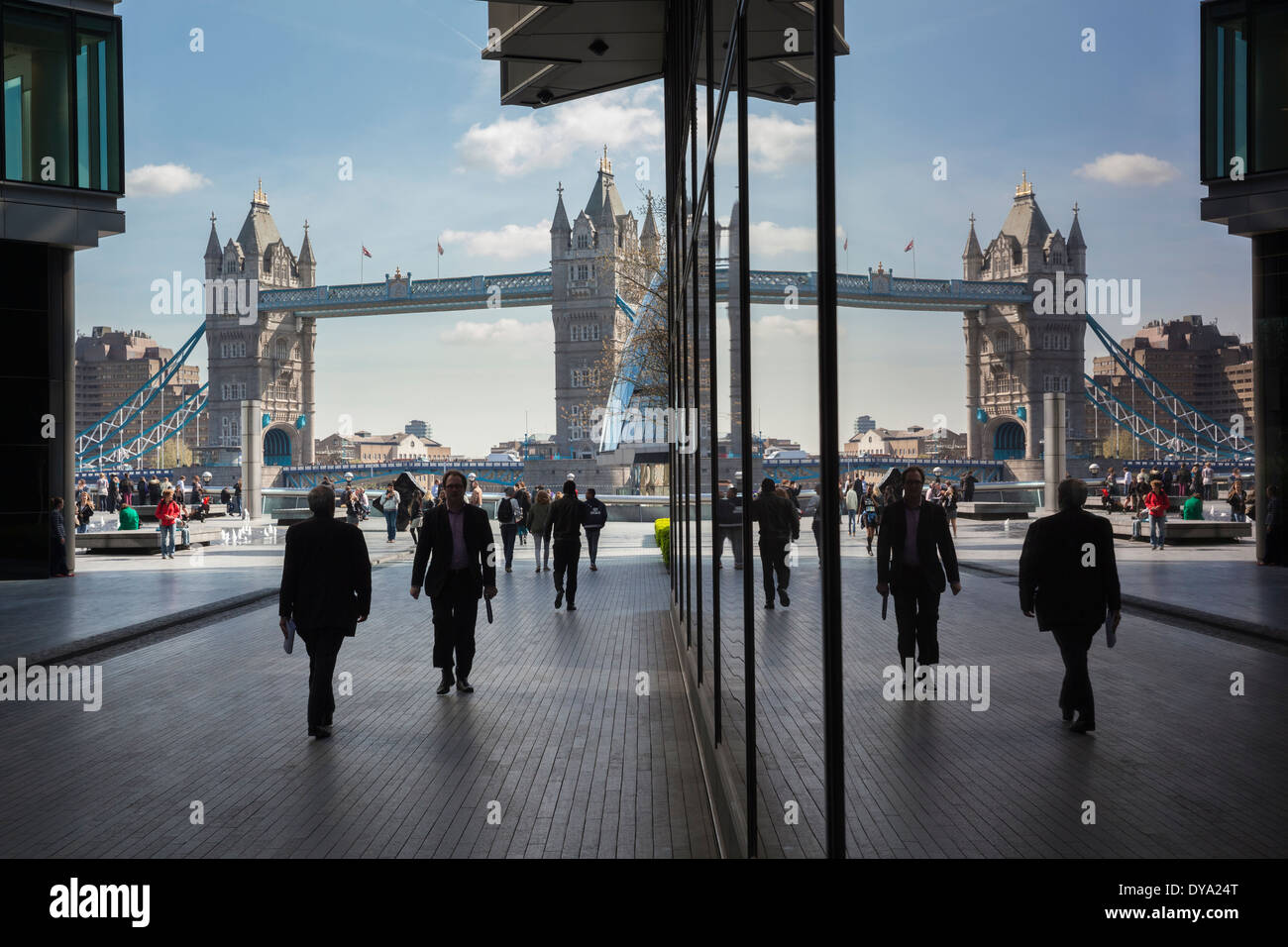 Tower Bridge reflecting in the windows of the More London Piazza in ...