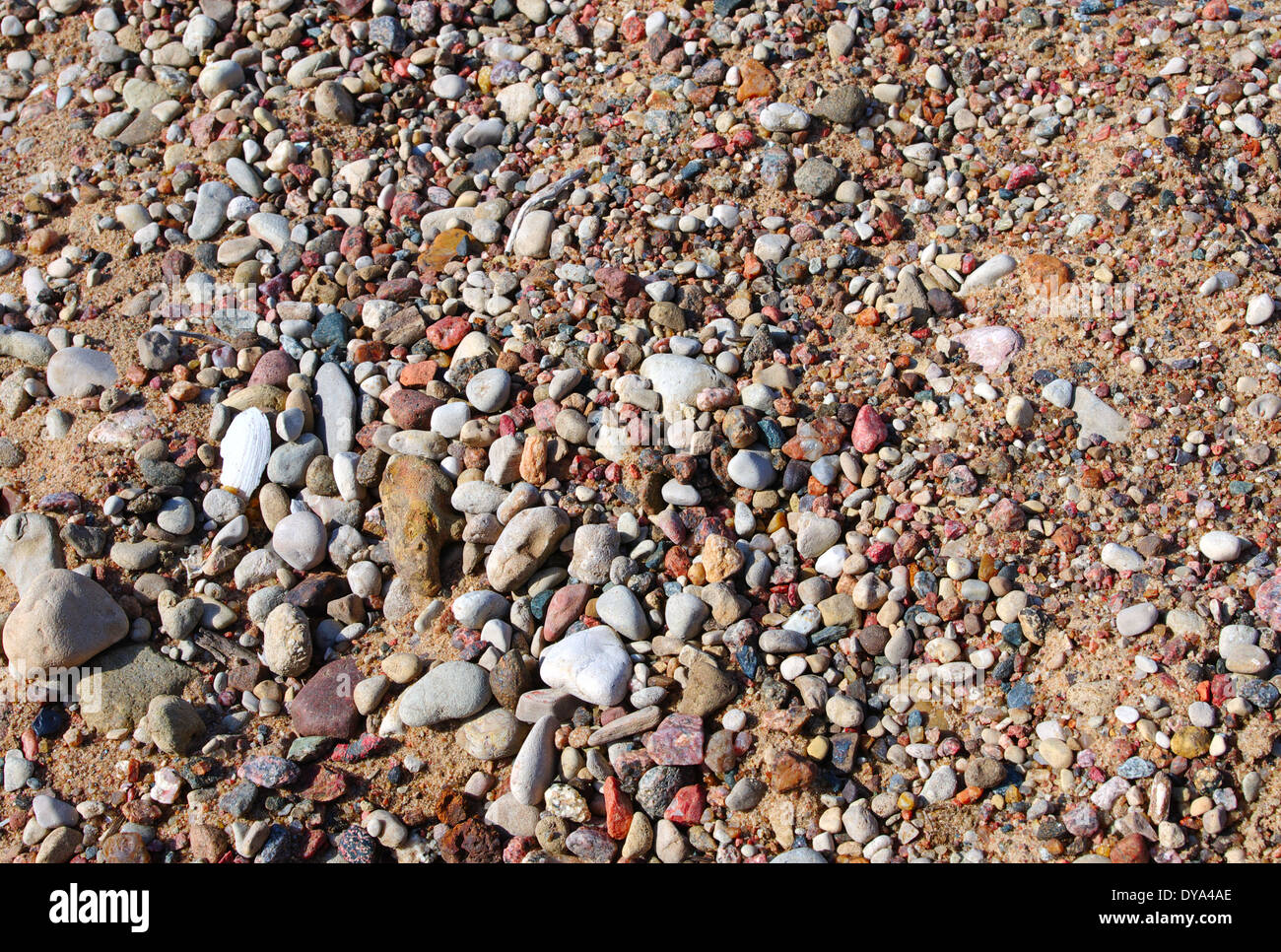 Background of river stones and sand Stock Photo - Alamy