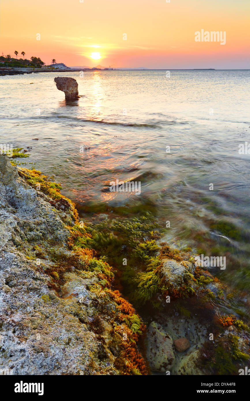 Las Rotas beach at sunset. Denia. Alicante. Spain Stock Photo - Alamy