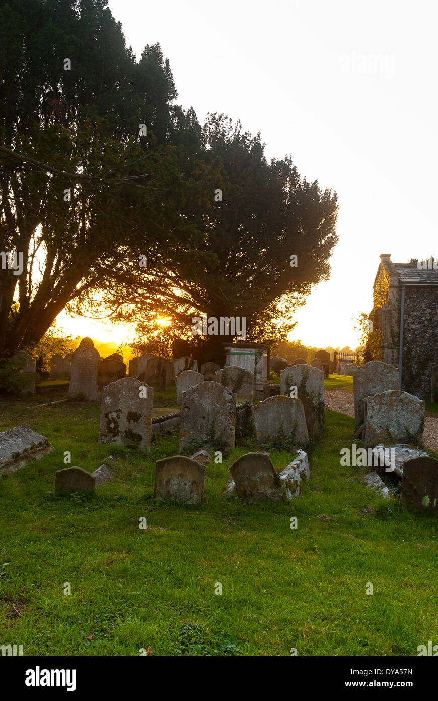 Graveyard at sunset Stock Photo - Alamy