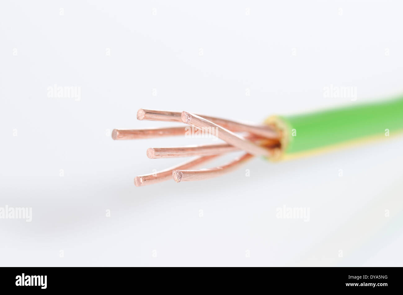 electrical cable end, exposed copper with green and yellow cable ...