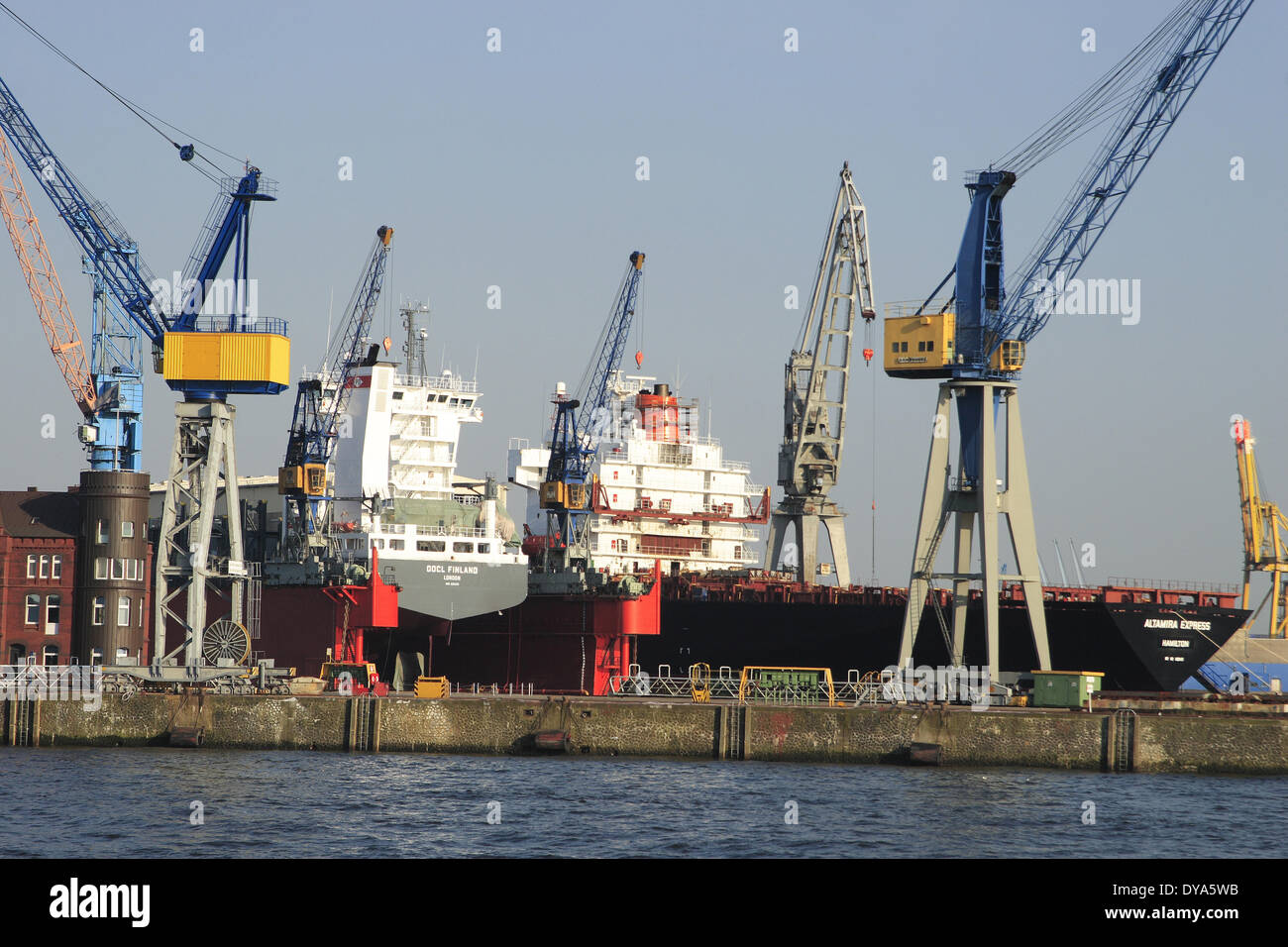 Container port container ship container terminal Germany outside Elbe ...