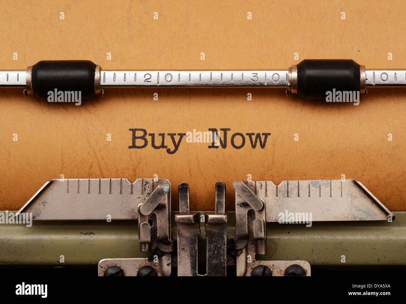 Buy now text on typewriter Stock Photo - Alamy