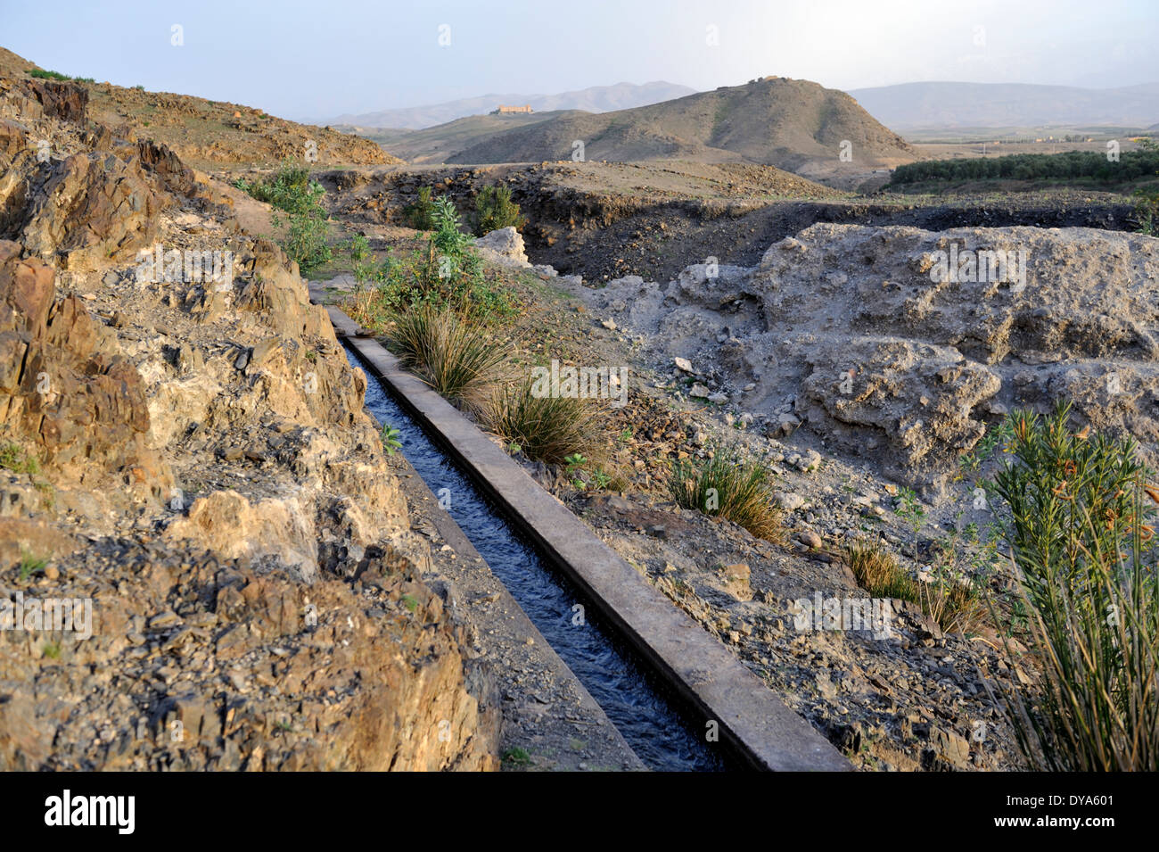 Small overground aqueduct with water originating from a qanat in the ...
