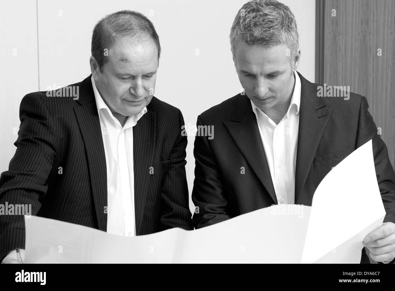 Two men in round Black and White Stock Photos & Images - Alamy