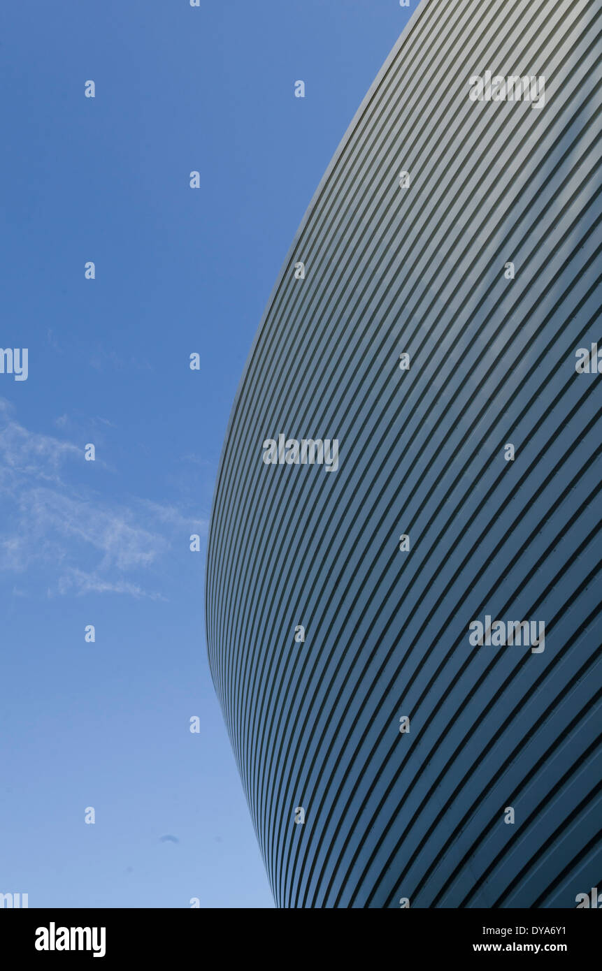 Blue sky and side of modern building, grey Stock Photo - Alamy