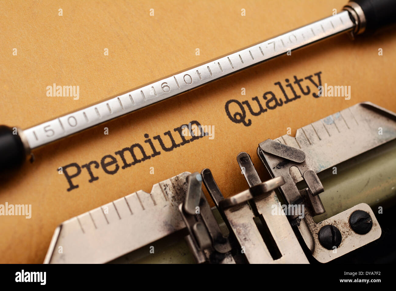 Premium quality text on typewriter Stock Photo - Alamy
