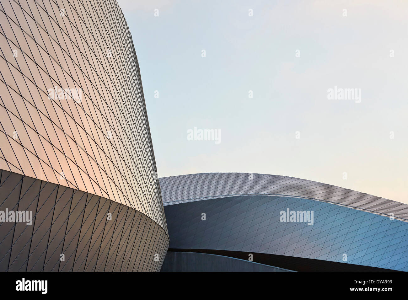 Abstract graphic diamond shaped shimmering folded facade cladding hi ...