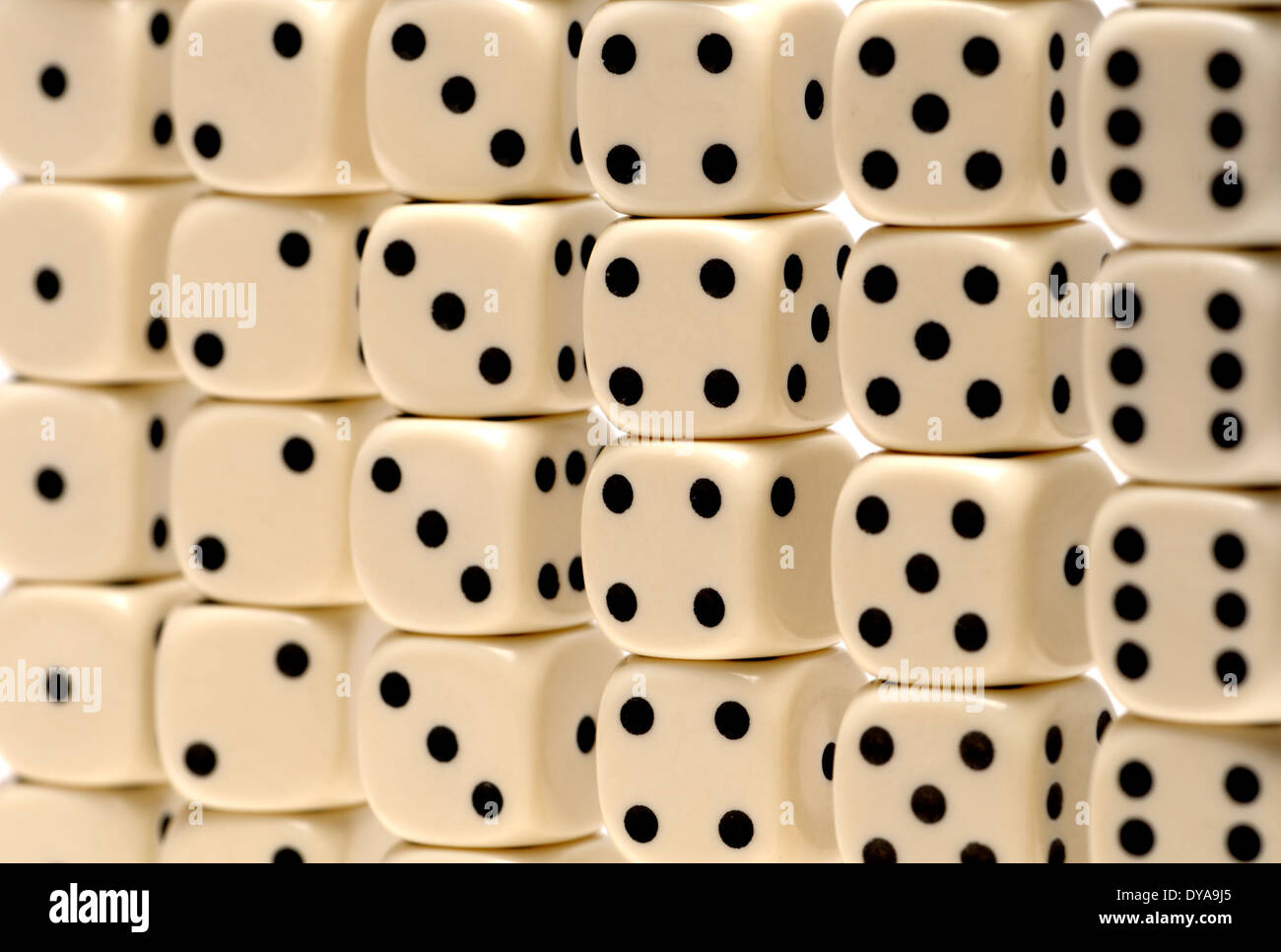 Dice - in ordered piles Stock Photo - Alamy