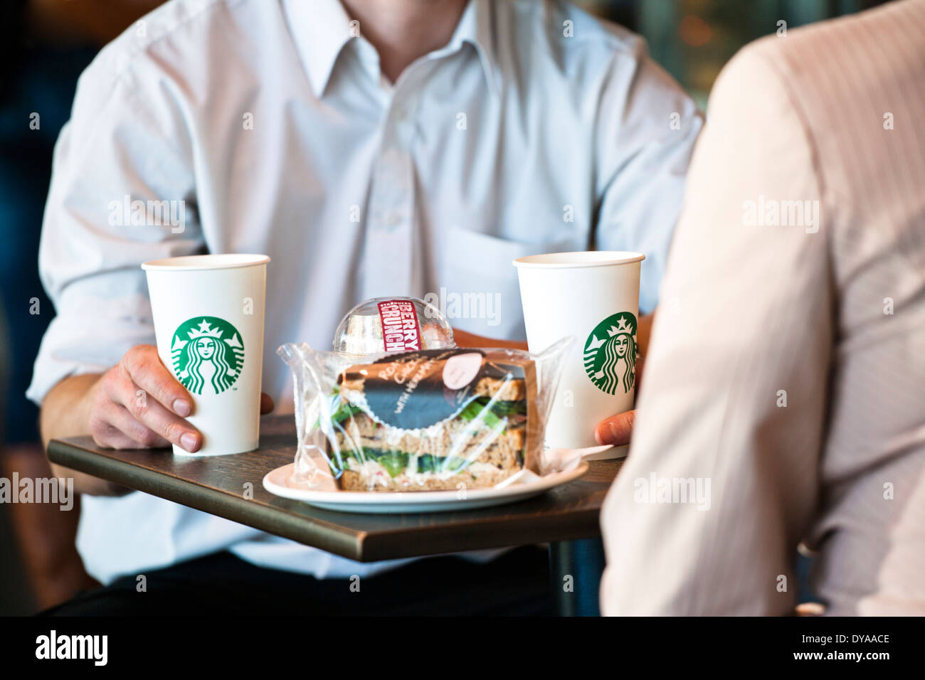 Drinking starbucks coffee hi-res stock photography and images - Alamy