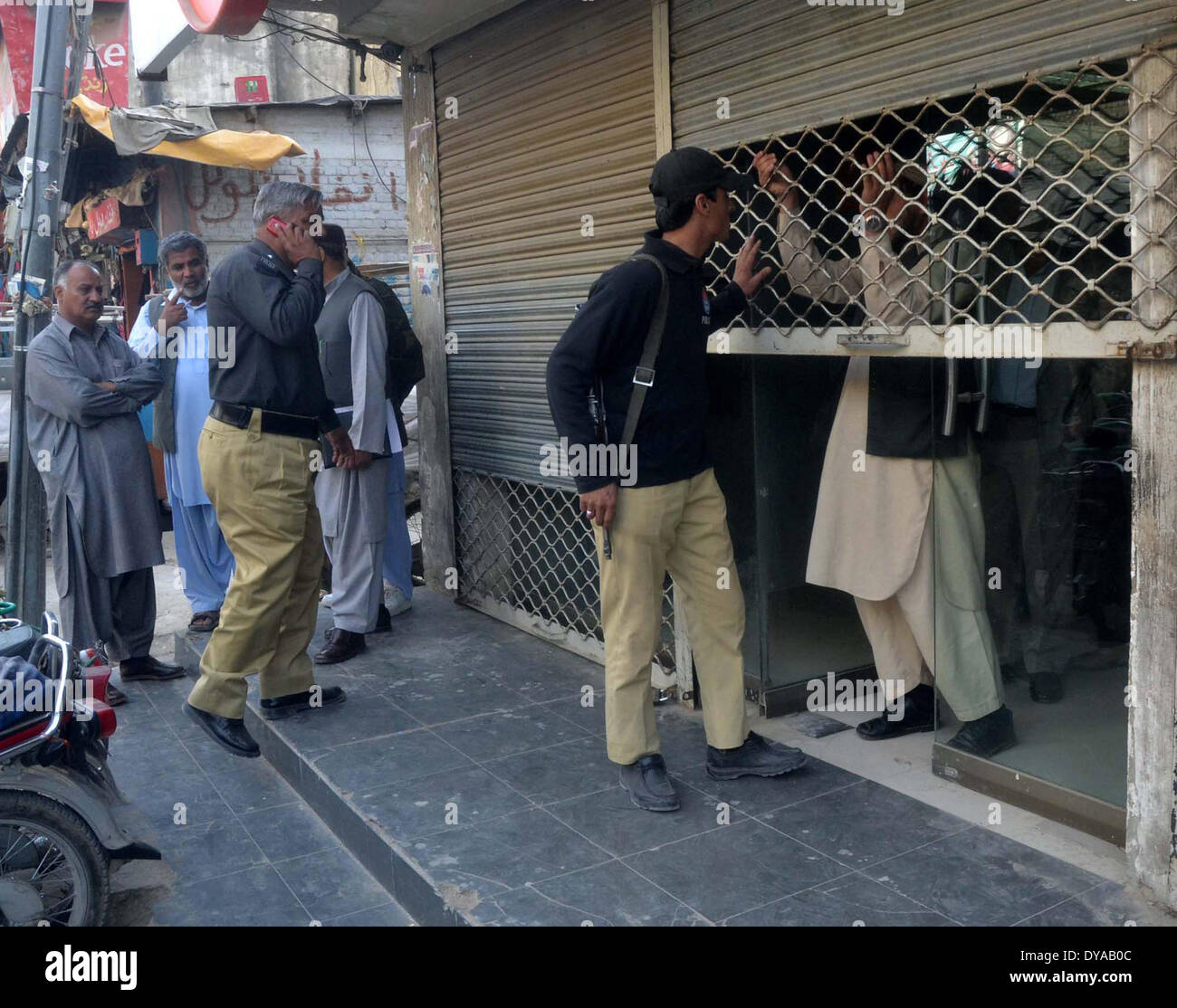 Security official are at venue after robbery in a private bank located ...