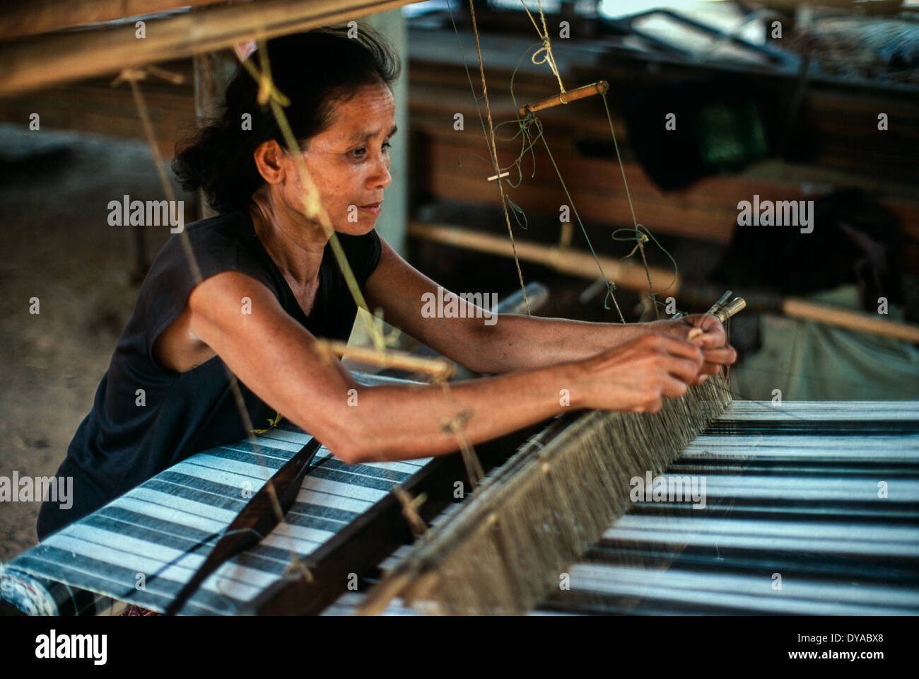 Laos woman sitting loom community weaver fabric threads weaving Stock ...