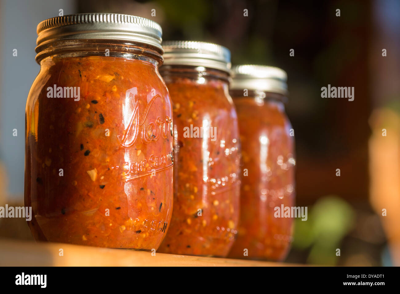 Glass jar of salsa Stock Photo - Alamy