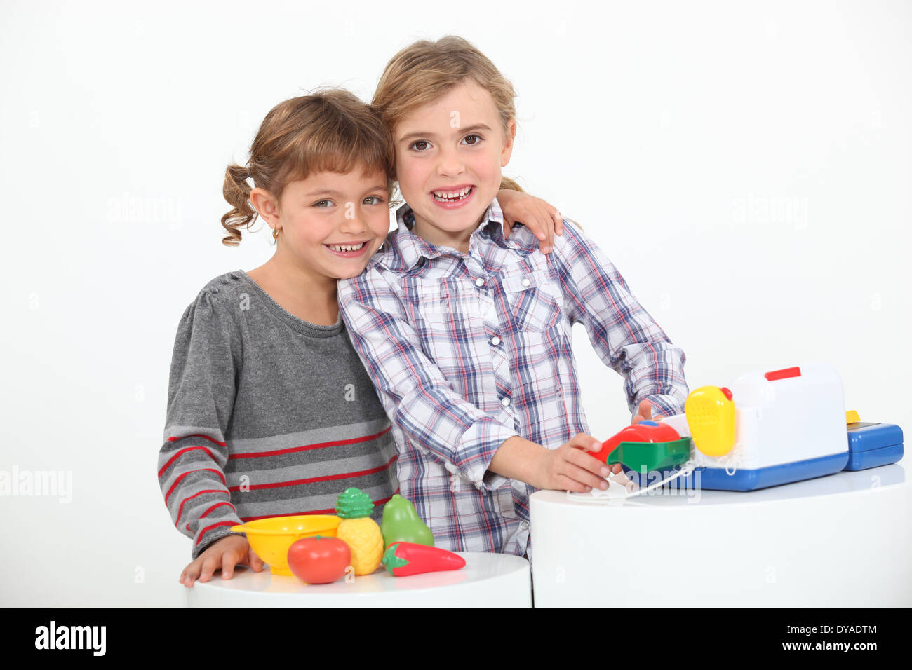 portrait of two children playing Stock Photo - Alamy