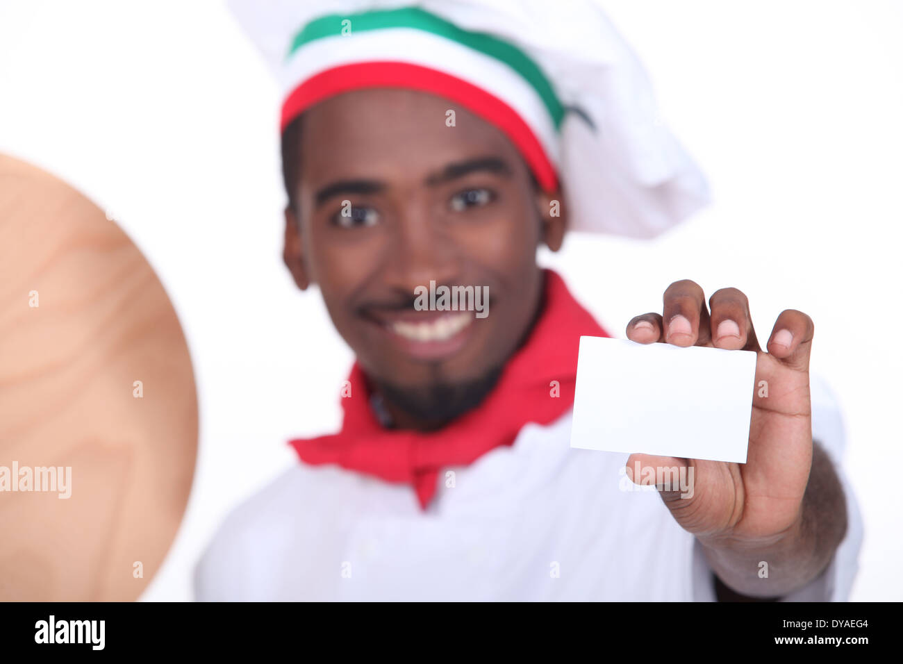 pizza chef holding a business card Stock Photo - Alamy