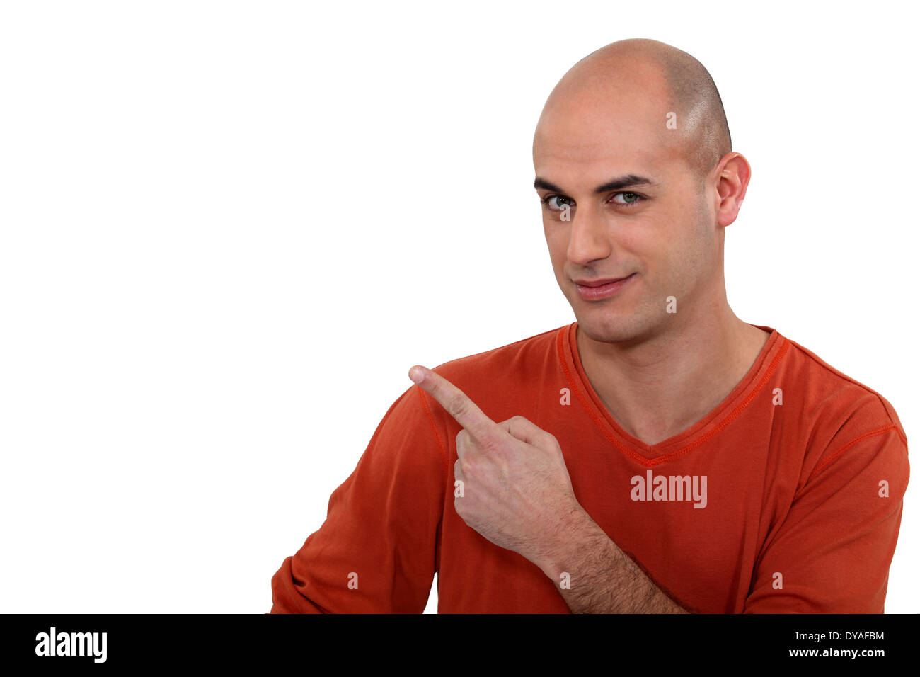 Bald man pointing Stock Photo - Alamy