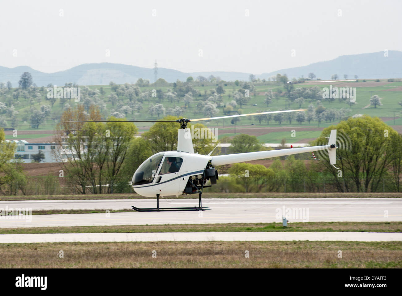 Helicopter in flight Stock Photo - Alamy