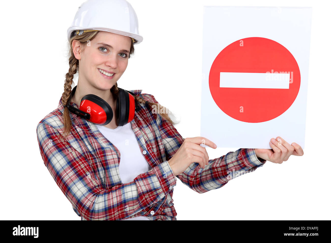 Woman holding a traffic sign Stock Photo - Alamy