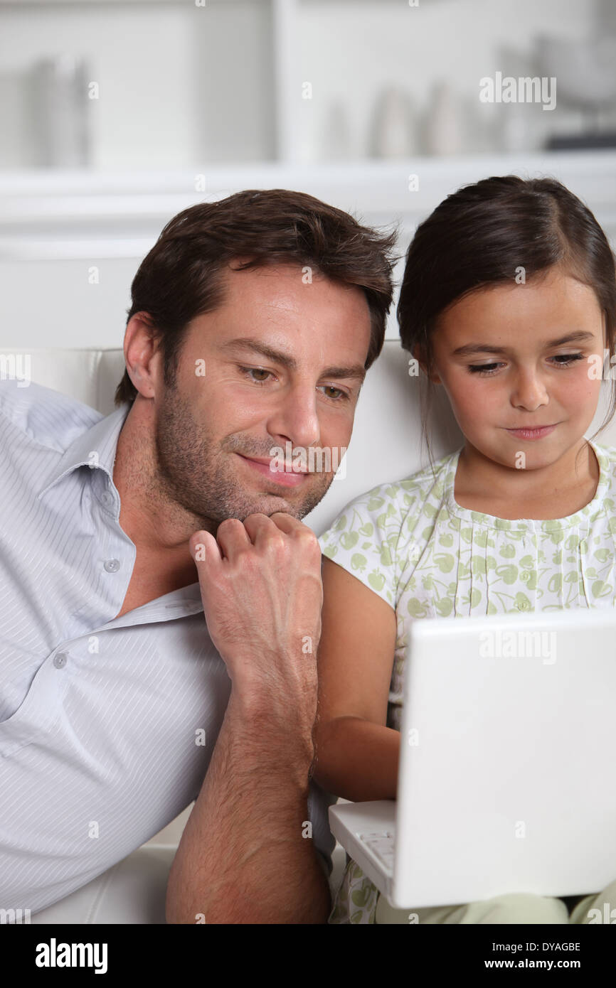 Father and daughter on the computer Stock Photo - Alamy