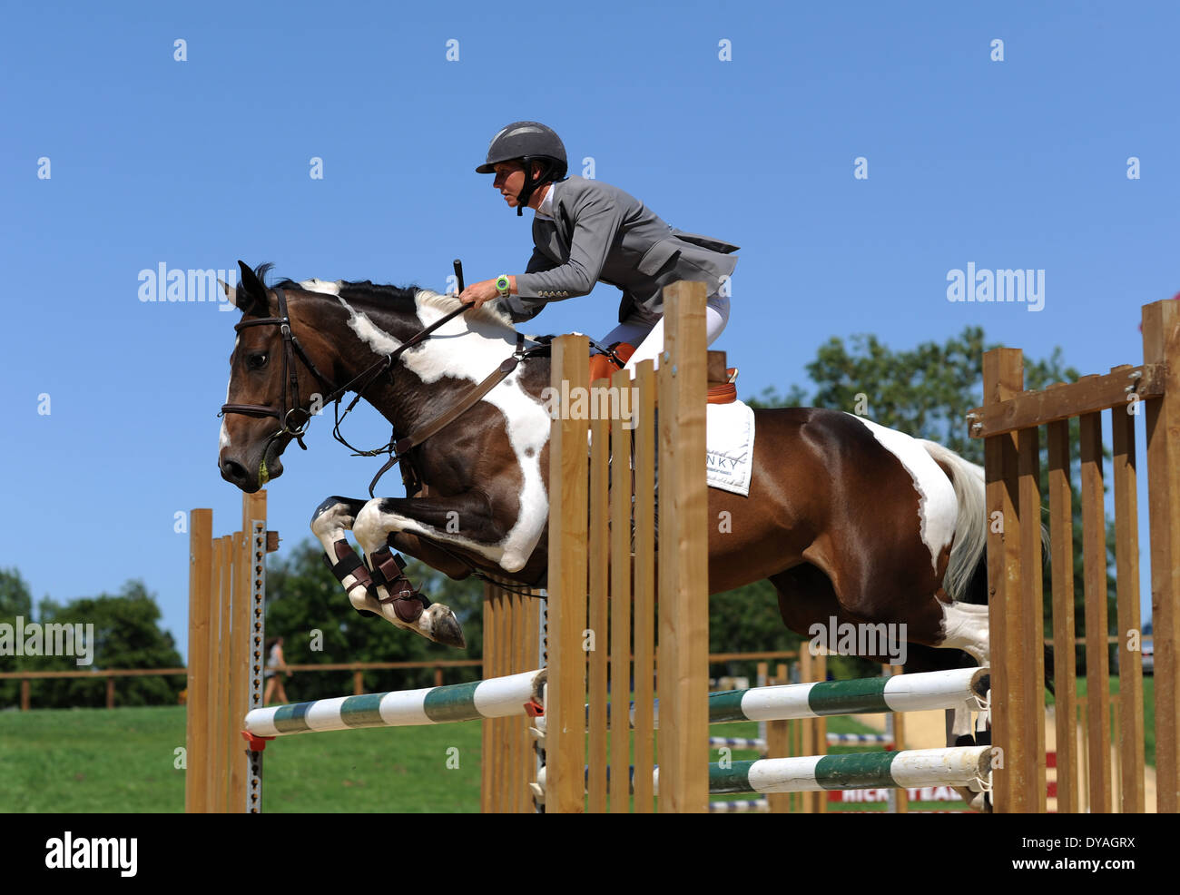 Woman jumps fence hi-res stock photography and images - Alamy