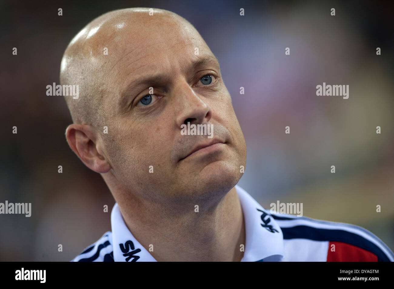 Sir Dave Brailsford looks on during a cycling race at the Olympic ...