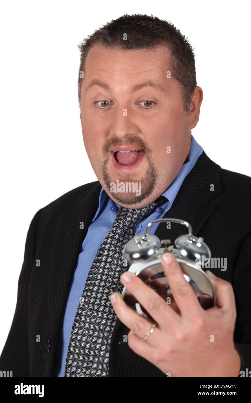 Man with clock Stock Photo - Alamy