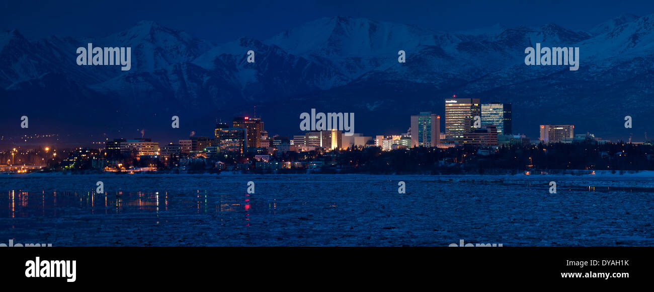 Night View Of The Anchorage Skyline With The Chugach Mountains In The ...