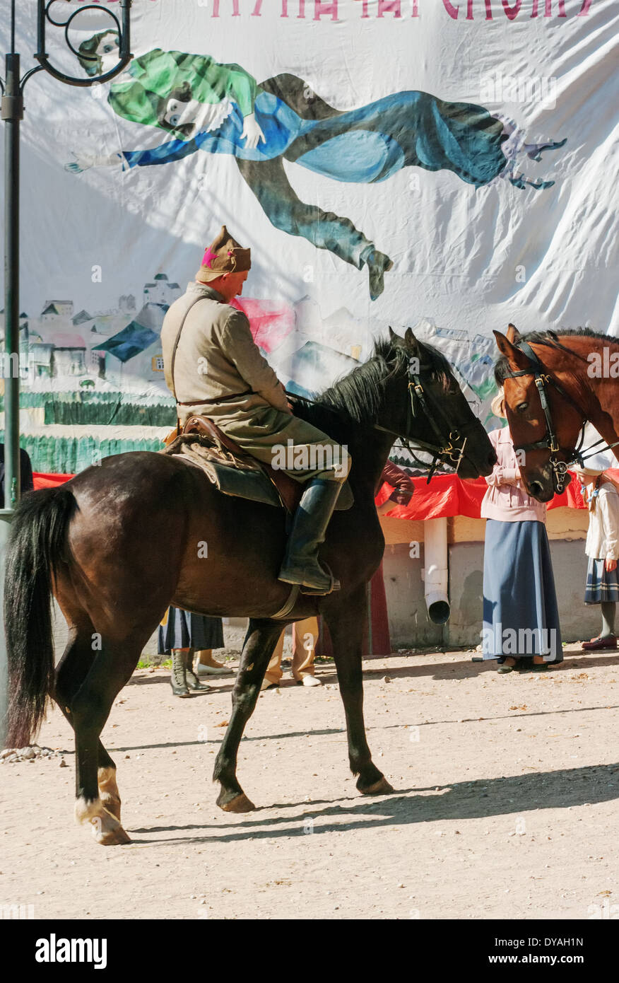 Festive parade on the city street. Red Army soldier on a horse Stock ...
