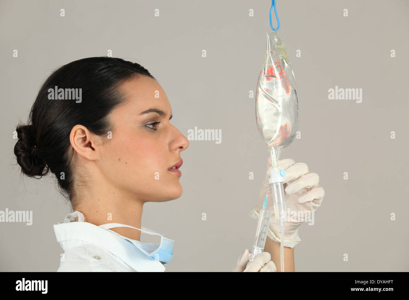 Nurse with intravenous drip Stock Photo - Alamy