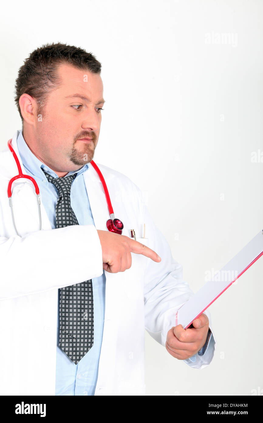 Doctor pointing a notepad Stock Photo - Alamy