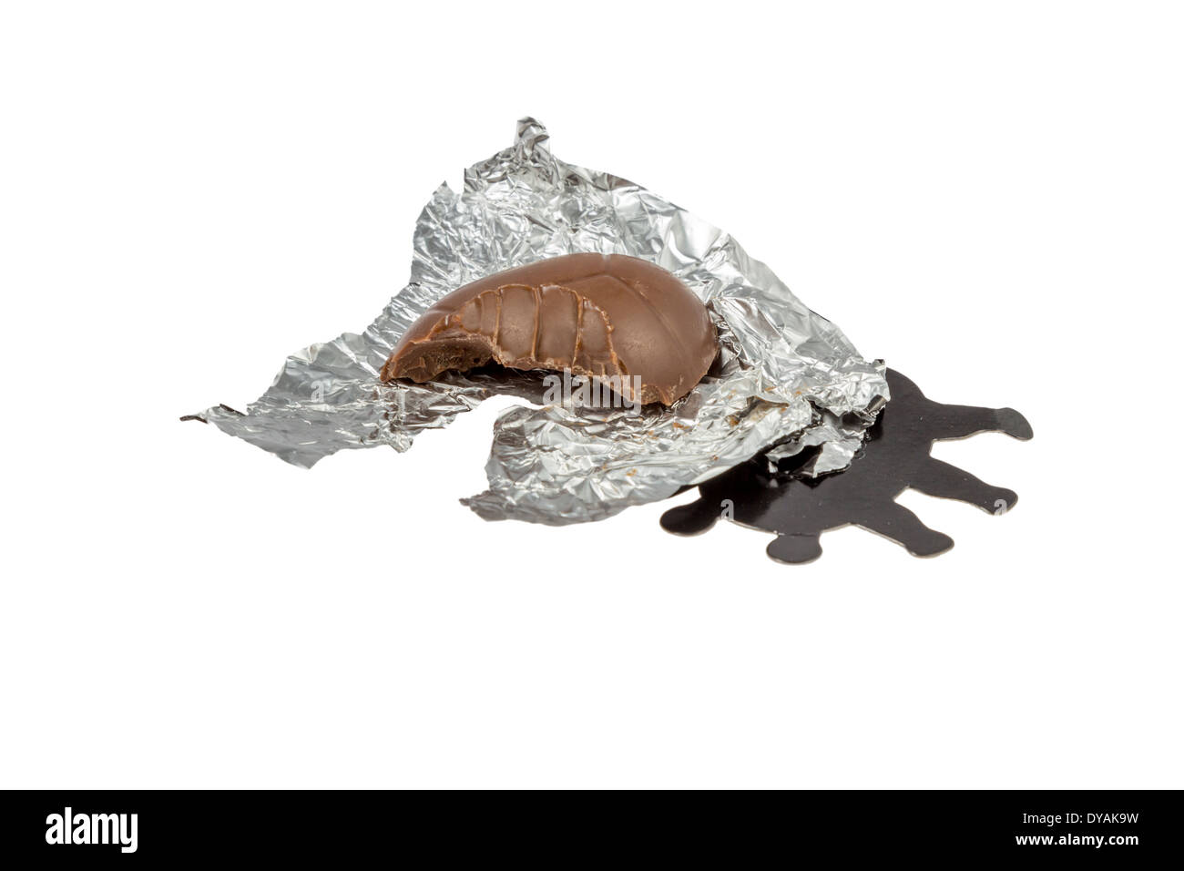 chocolate ladybird wrapped in aluminum foil isolated on white ...