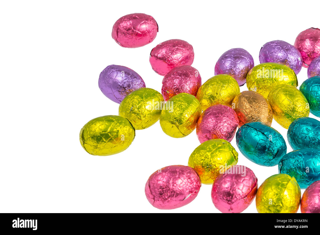 chocolate easter egg wrapped in aluminum foil isolated on white ...