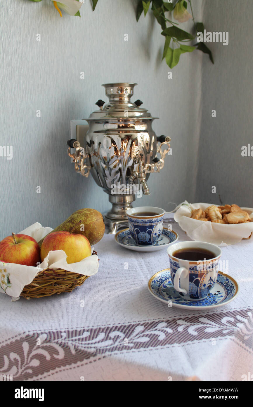 nice breakfast in Russian tradition with hot shine samovar two blue ...