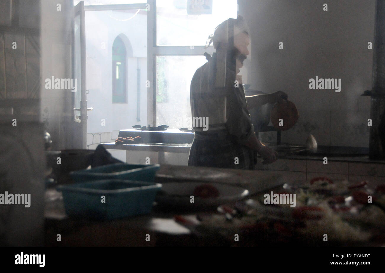 Balkh, Afghanistan. 10th Apr, 2014. An Afghan man makes traditional ...