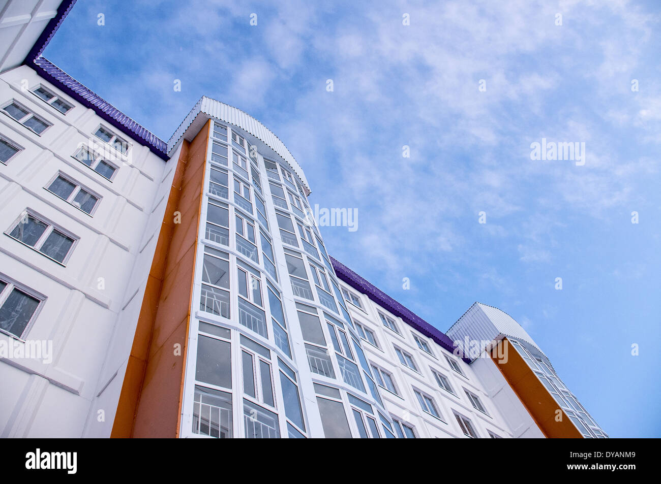 New building with a facade PVC windows and blue sky with clouds Stock ...