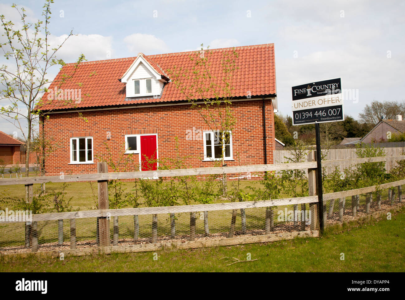 Fine and Country estate agent sign Under Offer outside modern house ...