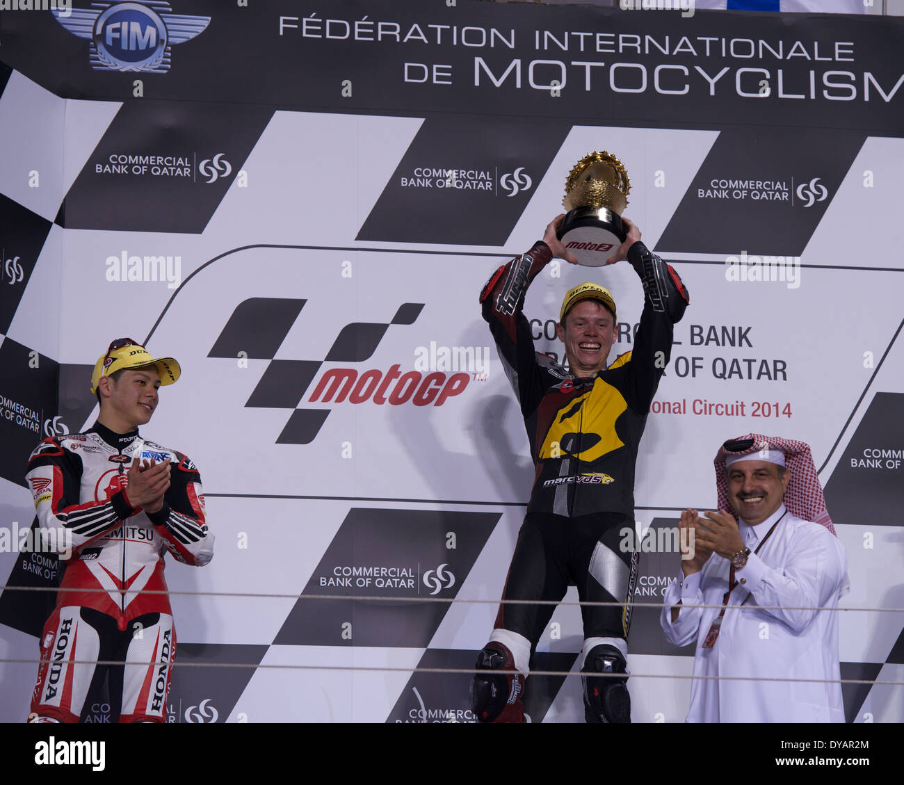 Losail Circuit, Doha, Qatar 23rd March 2014. Esteve Rabat lifts his ...