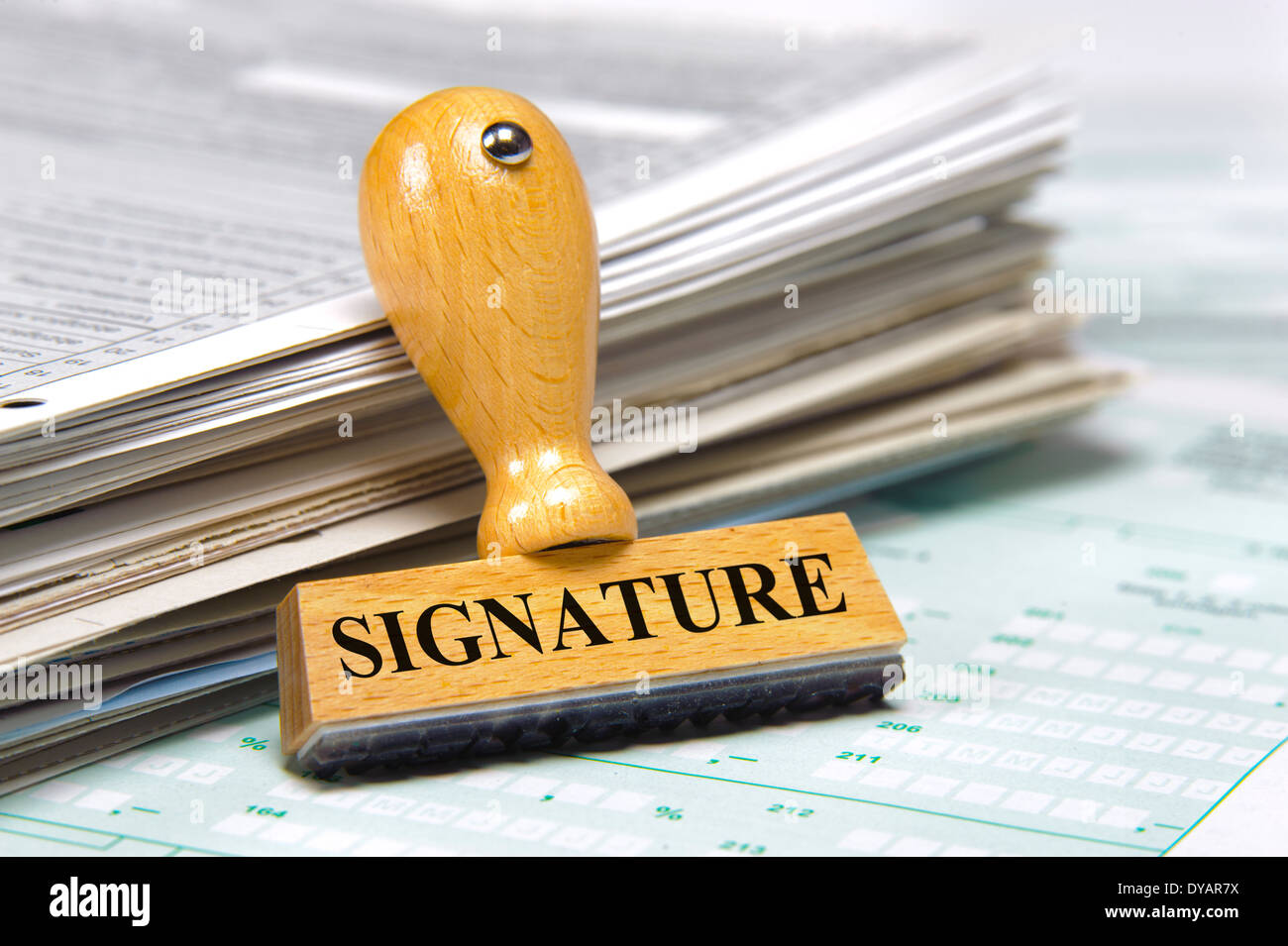 signature marked on rubber stamp with documents Stock Photo - Alamy