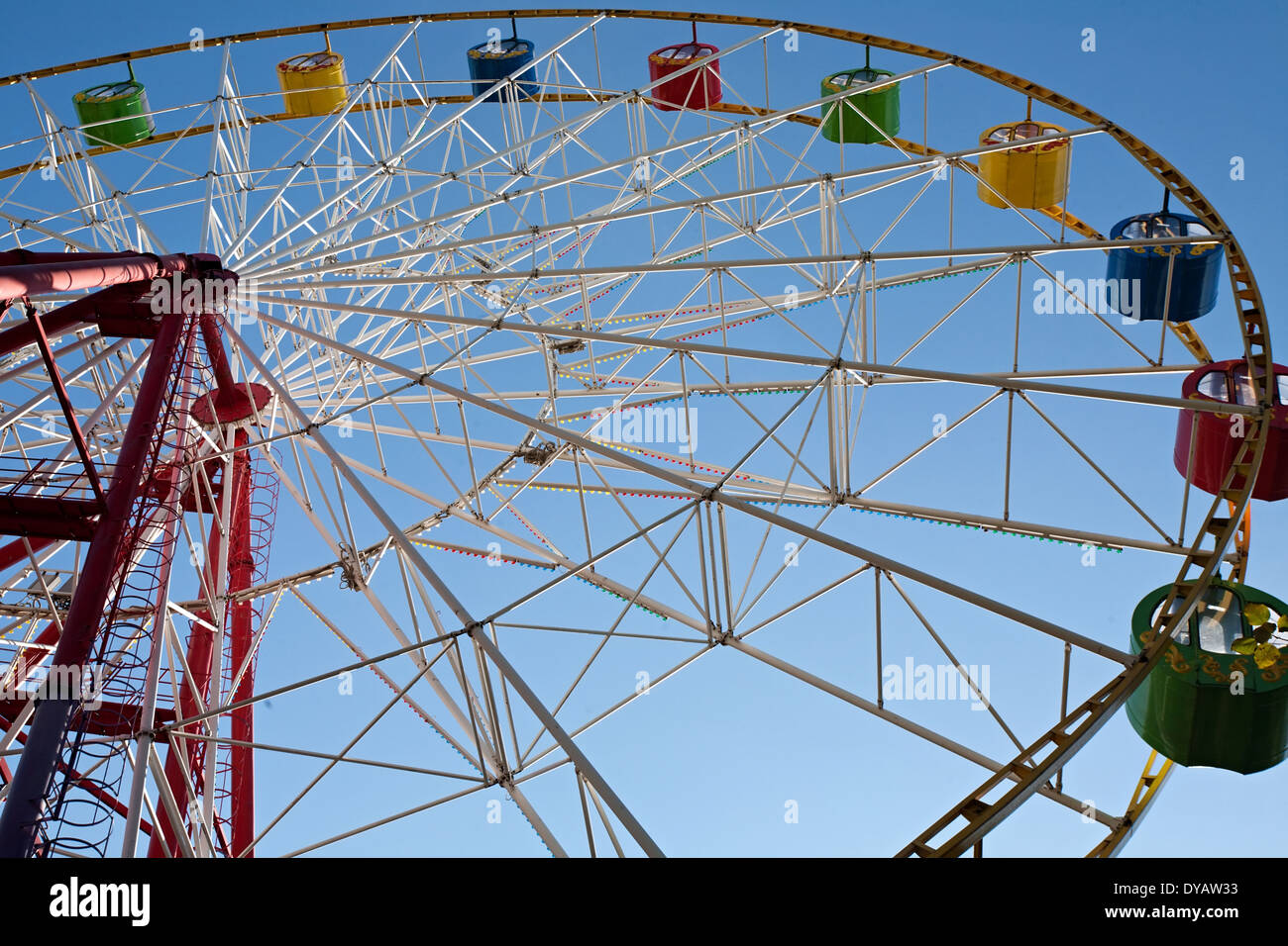 multicolored ferris wheel full size on blue sky background Stock Photo ...