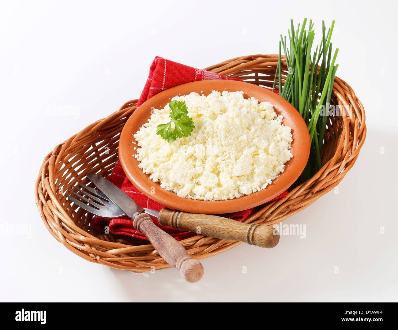 Bowl of Bryndza cheese and fresh chives in wicker basket Stock Photo ...