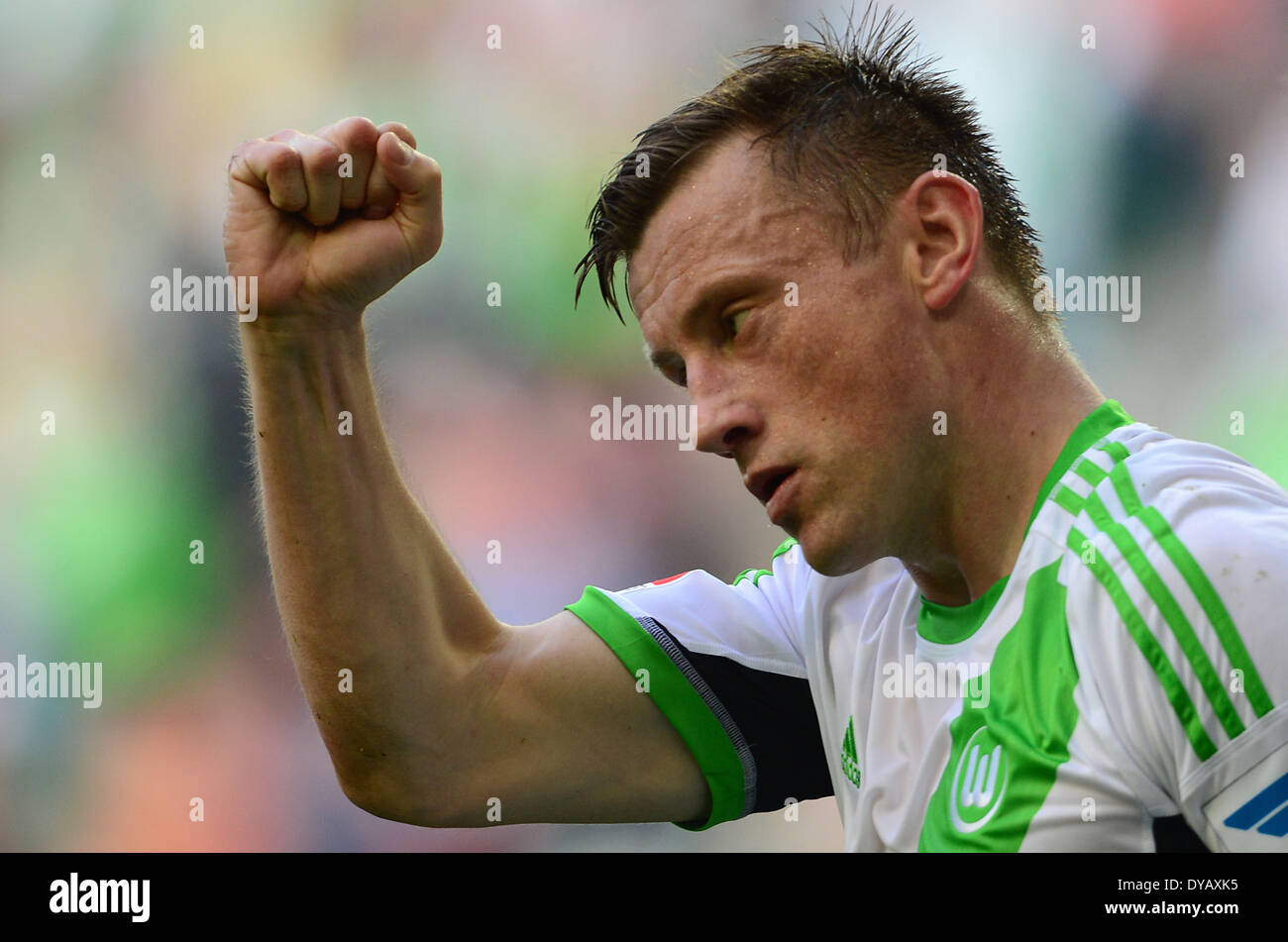Wolfsburg, Germany. 12th Apr, 2014. Wolfsburg's Ivica Olic celebrates ...