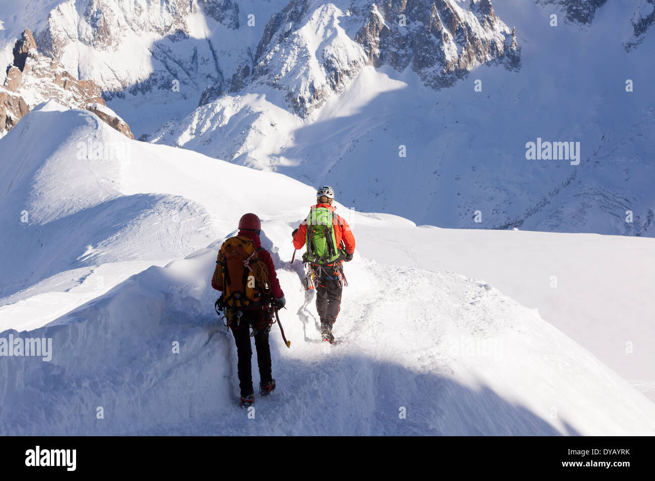 Mountaineers descend from a lookout point on the Aiguille Du Midi ...